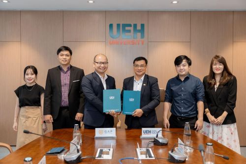 MoU signing ceremony between UEH College of Technology and Design and G ...